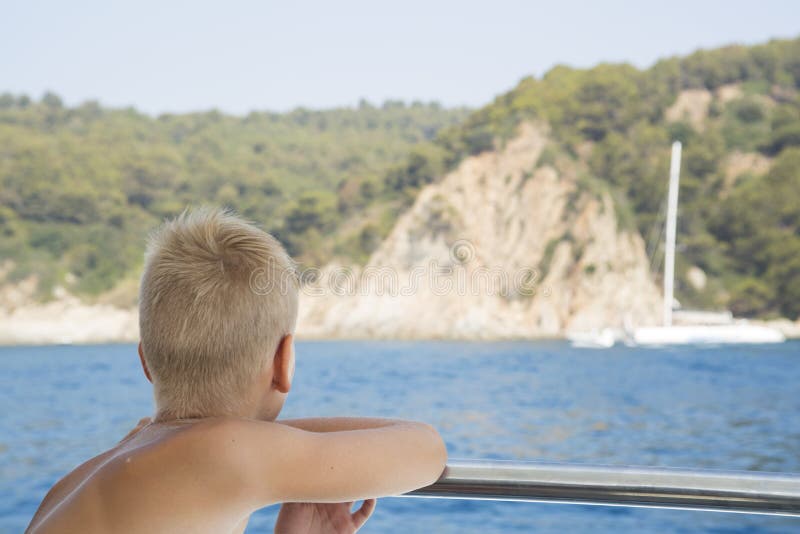 Boy Looks from Boat on the Sea Stock Image - Image of mountains, spain ...