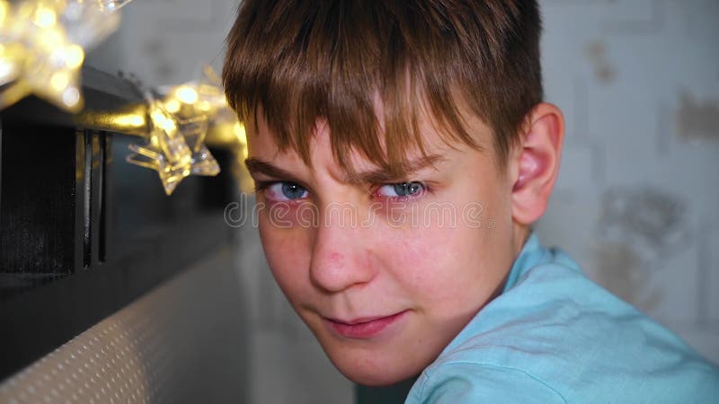 The Boy Looks at the Camera with a Stern Look Stock Video - Video of ...