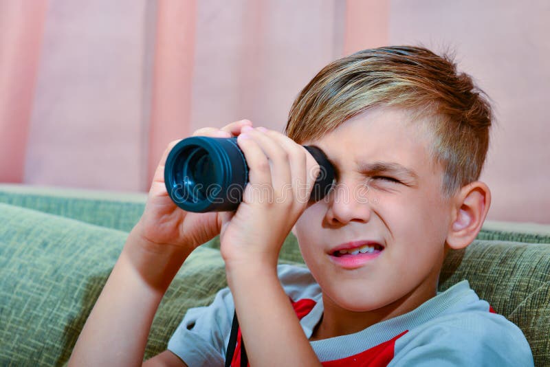The Boy Looks in a Monocle. Stock Photo - Image of male, intelligence ...