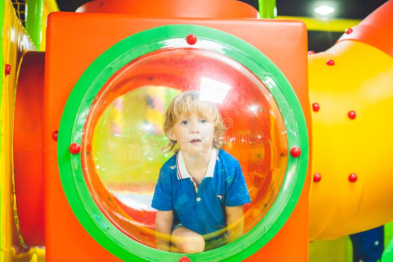 A Boy Looks Out from the Playground in Kindergarten Stock Image - Image ...