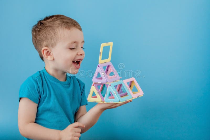 Boy Looks through the Shape in the Color Constructor with the ...