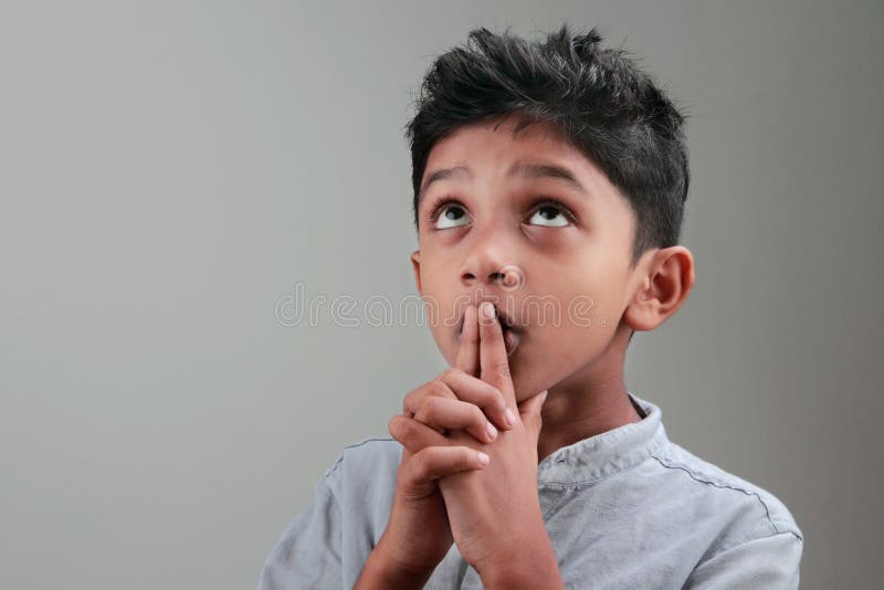 A boy looks up stock image. Image of imagination, pensive - 89690763