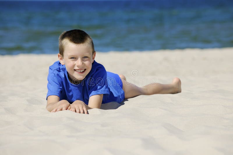 463 Smiling Boy Lying Water Beach Stock Photos - Free & Royalty-Free ...