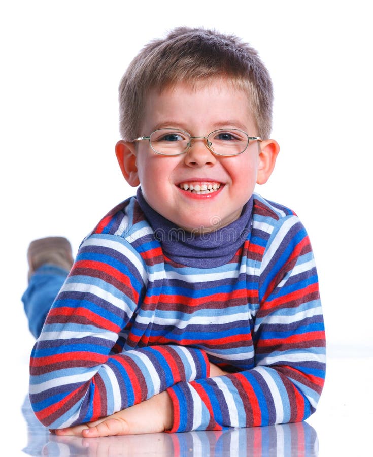 Boy lying down stock image. Image of happy, preteen, childhood - 55767395