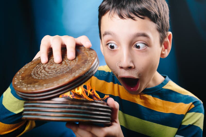 Boy with magic box stock photo. Image of expression - 101771930
