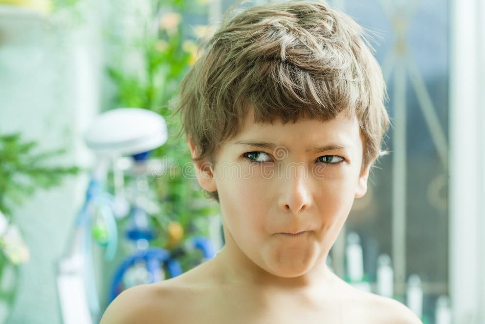 Boy making faces indoors stock photo. Image of portrait - 36238894