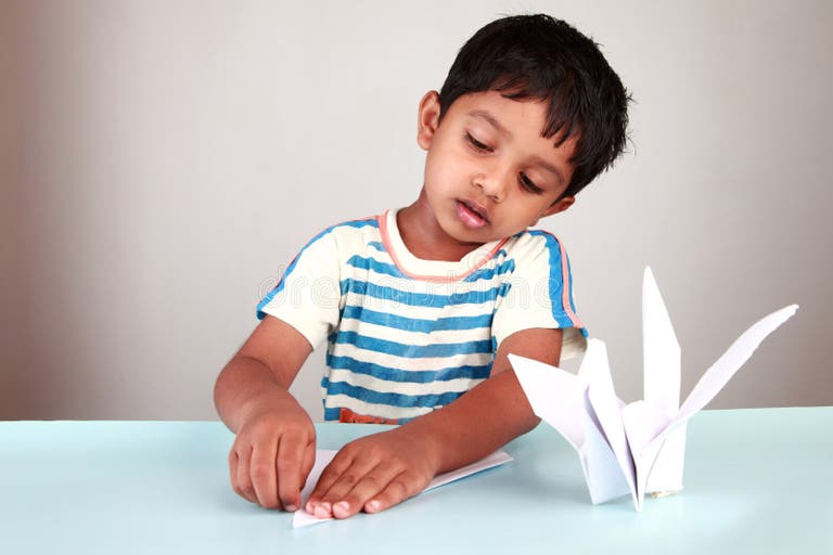 401 Boy Making Origami Stock Photos - Free & Royalty-Free Stock Photos ...