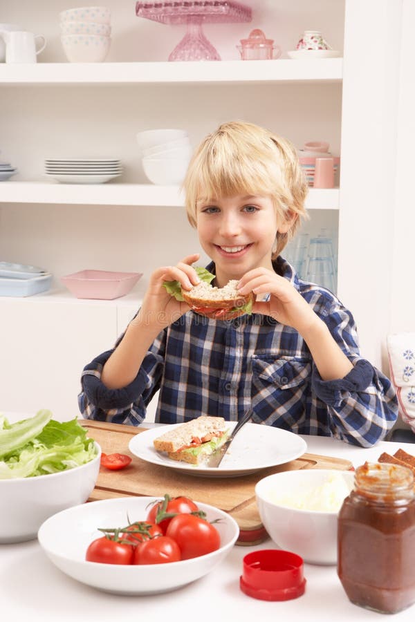 Boy Making Sandwich in Kitchen Stock Photo - Image of indoors ...