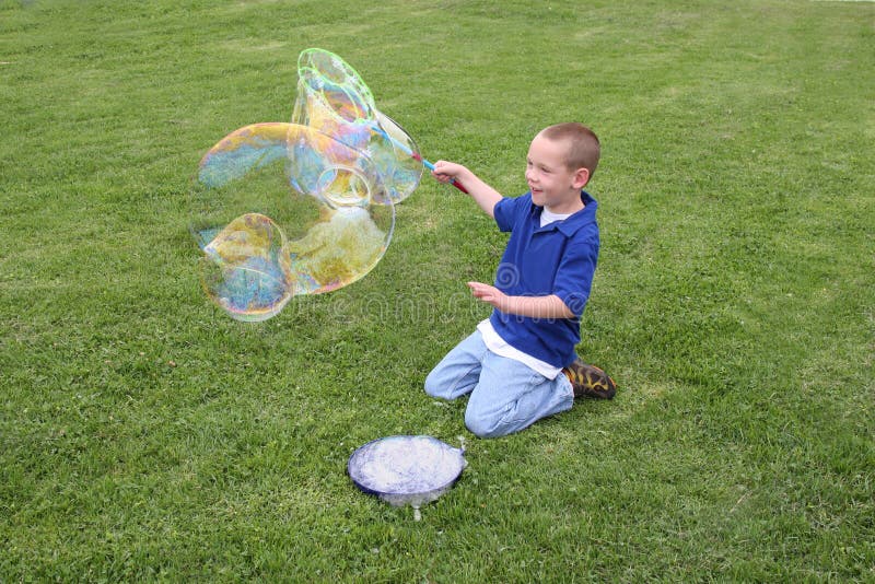 Boy making soap bubbles stock image. Image of bubbles - 11842967