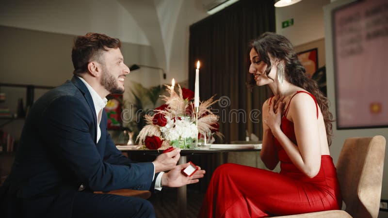 Boy Making Wedding Proposal at the Table of a Luxury Restaurant Stock ...