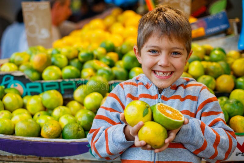 Boy on the market stock photo. Image of marketplace, customer - 69823404