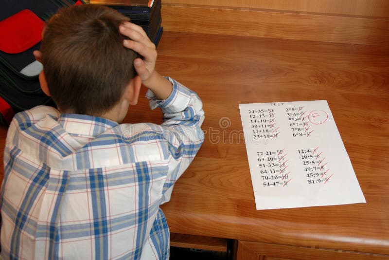 Boy with math test stock photo. Image of table, test - 11125460