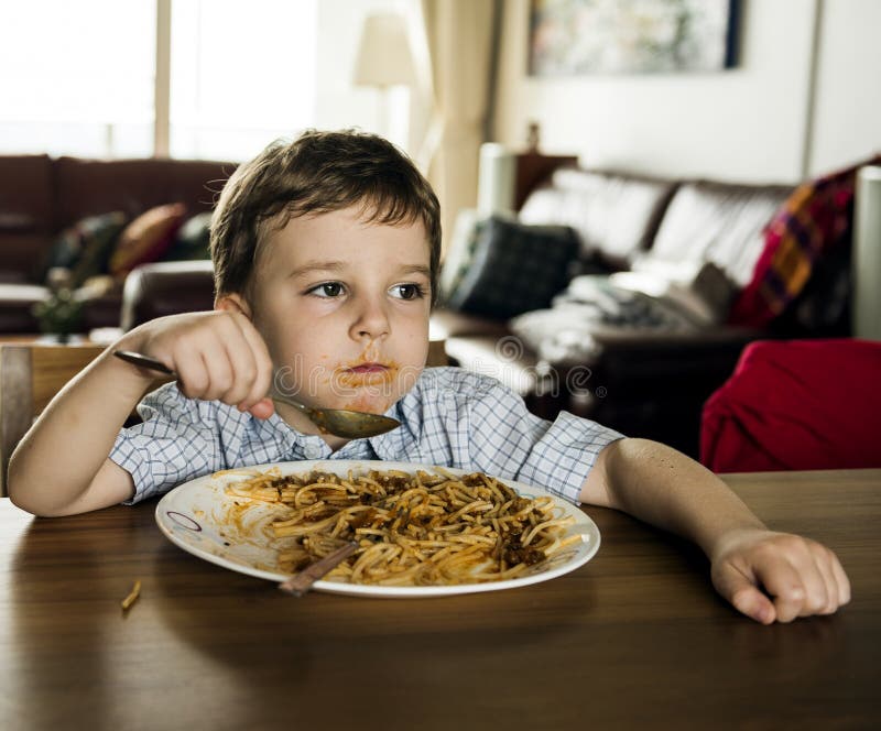 Boy Mealtime Eating Spaghetti at Home Stock Image - Image of pasta ...