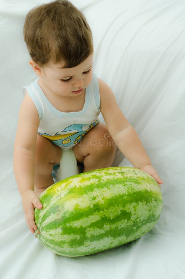 Boy with melon stock photo. Image of strong, little, brown - 26188976