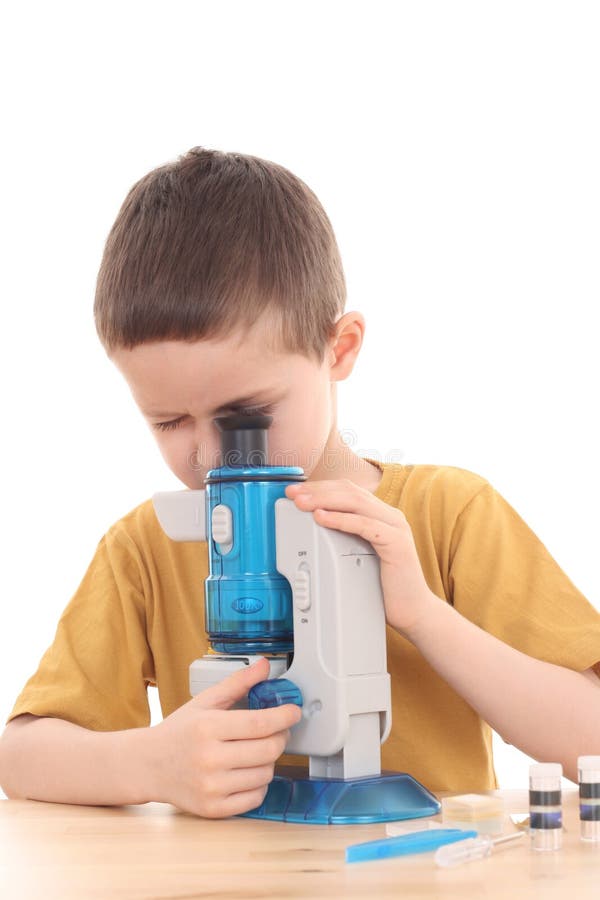 Child with microscope stock image. Image of expertise - 13838641