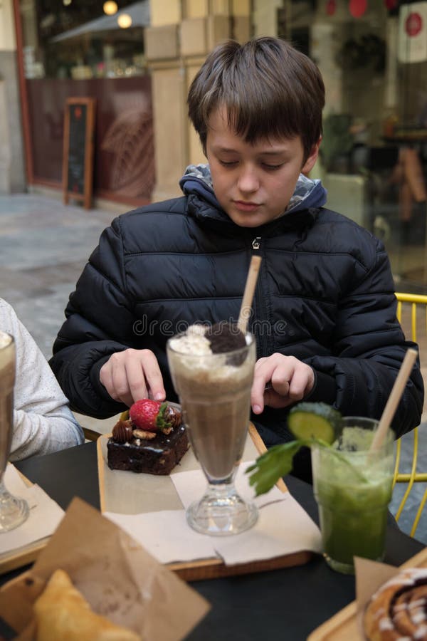 A boy with a milkshake stock photo. Image of happiness - 251072688