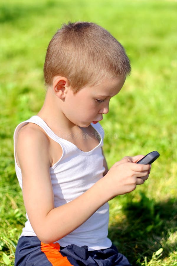 Boy with Mobile Phone stock image. Image of explore, gadget - 28946881