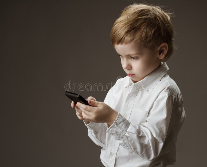 Boy with mobile phone stock image. Image of calling, mobile - 29139629