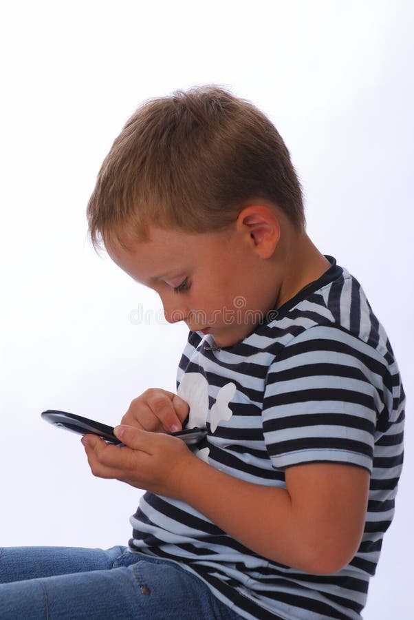 A Boy With Mobile Phone Picture. Image: 3231730
