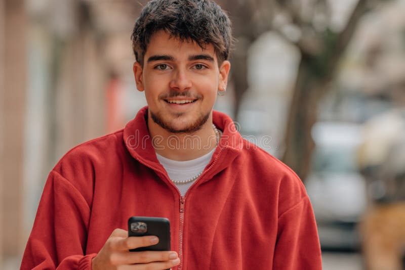 Boy with mobile phone stock image. Image of outdoor - 266148219
