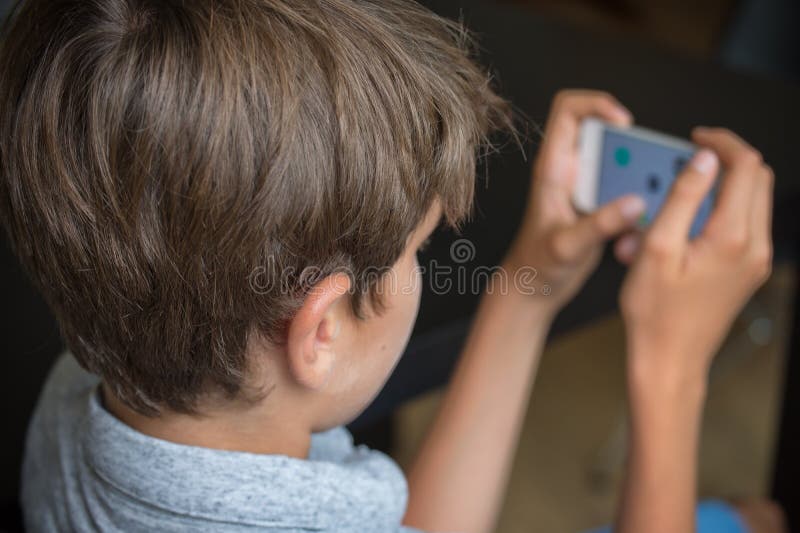 Hands of a a Boy with a Mobile Phone Stock Photo - Image of teen ...
