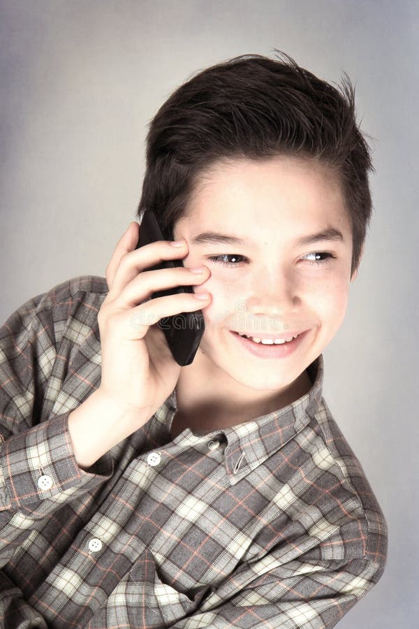 Boy at the mobile phone stock photo. Image of talking - 40236842