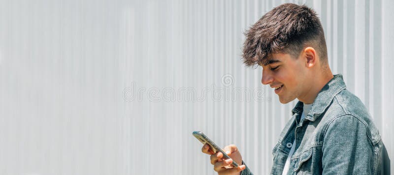 Boy with Mobile Phone Outdoors Stock Image - Image of online, casual ...