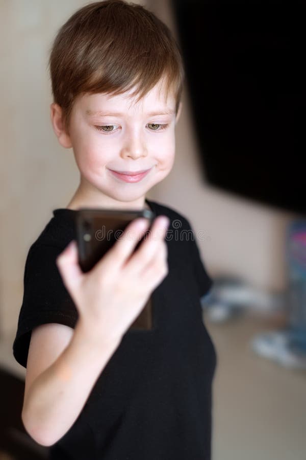 Boy with a Mobile Phone Speaks Stock Photo - Image of internet, calling ...