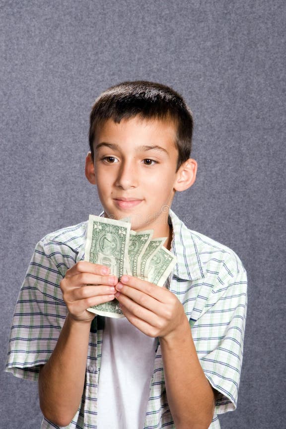Boy with Money stock image. Image of excited, showing - 3329151