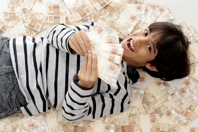 Boy and Money stock image. Image of brazilian, young - 36623933