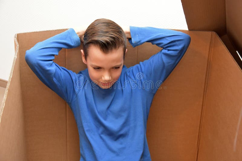 Boy in moving box stock photo. Image of empty, cargo - 65802640