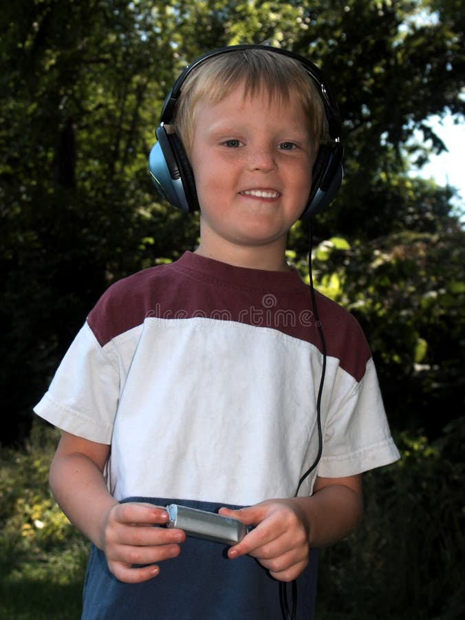Boy with music stock photo. Image of child, earphones - 1932668