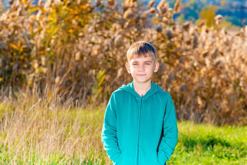 A Boy in Nature Poses for the Camera Stock Photo - Image of life, model ...