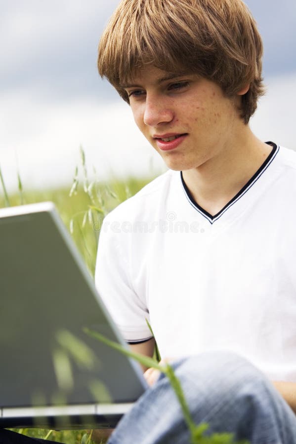 Boy with Notebook on the Field Stock Image - Image of happy, field: 5601377