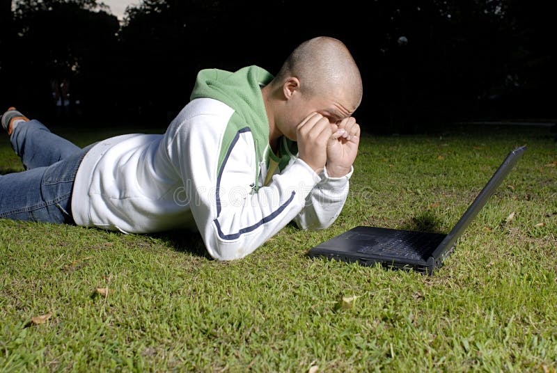 Boy with notebook in park stock photo. Image of meadows - 1427714