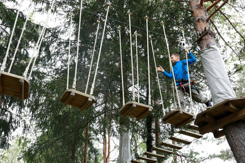 Boy on a rope ladder stock photo. Image of childhood - 42304256
