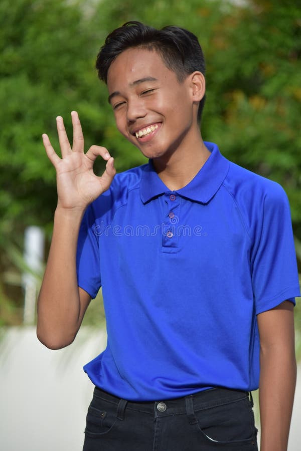 Boy and Okay Sign stock image. Image of sign, symbol - 141590467