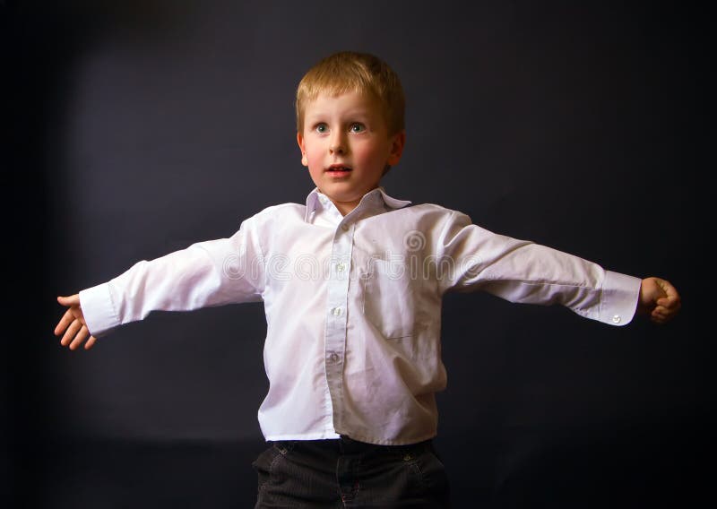 Boy with Open Arms stock image. Image of fingers, looking - 13492793