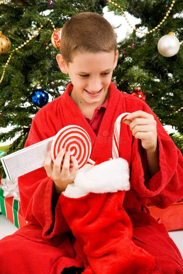 Boy Opening Christmas Stocking Stock Image - Image of happy, stocking ...
