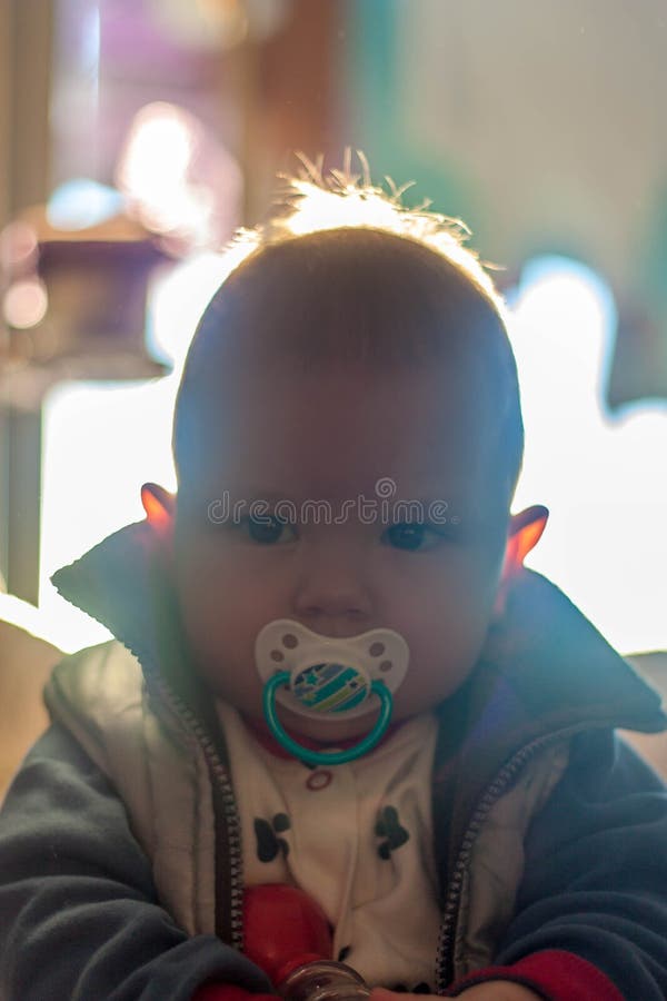 Boy with pacifier stock image. Image of young, cute, childhood - 73585123