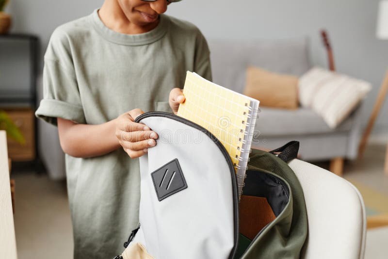 Boy Packing Backpack Close Up Stock Photo - Image of homeschooling ...