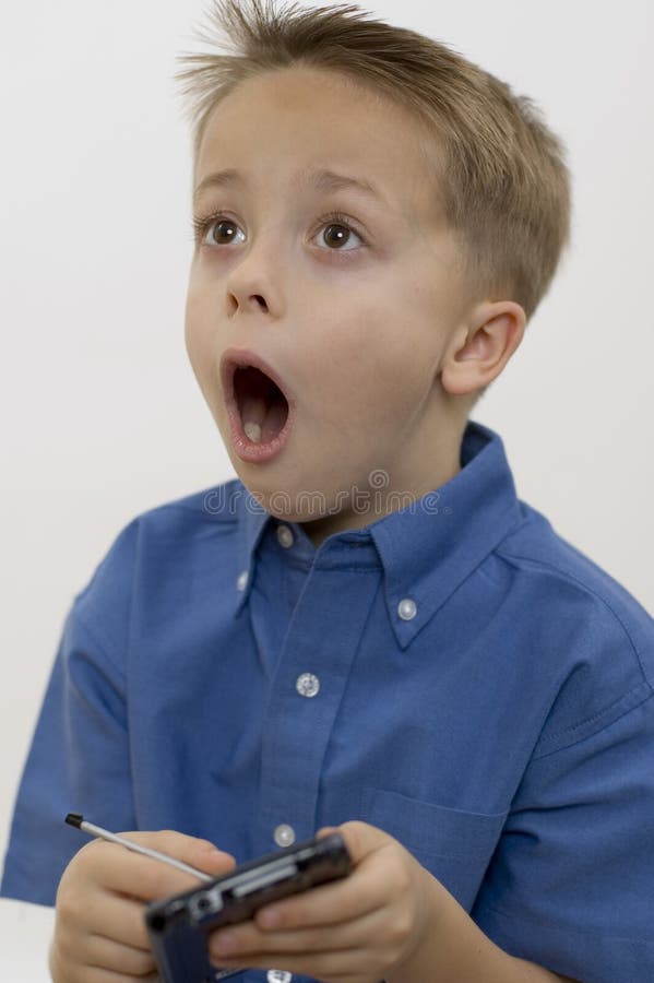 Boy / palmtop / white stock image. Image of active, faces - 286285