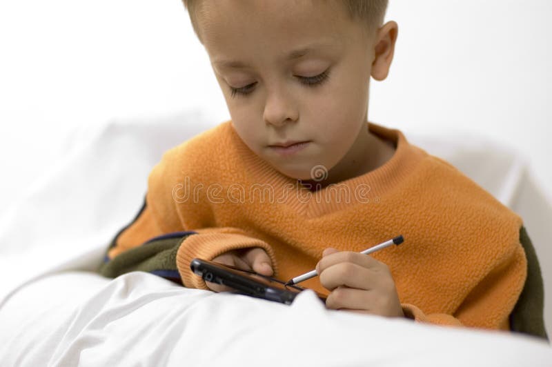 Boy / palmtop / white stock photo. Image of lesson, beautiful - 286348