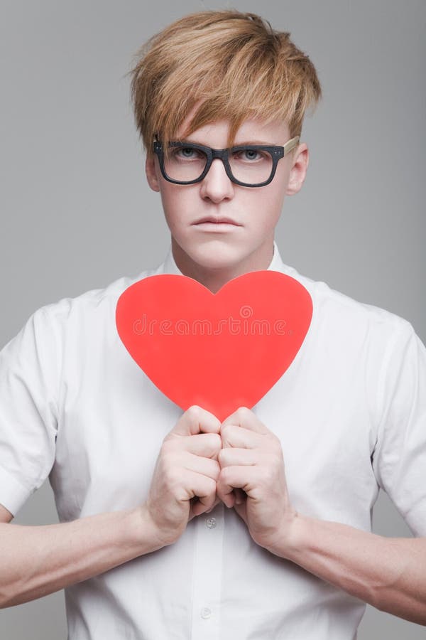 Boy with paper heart stock photo. Image of student, love - 55743588