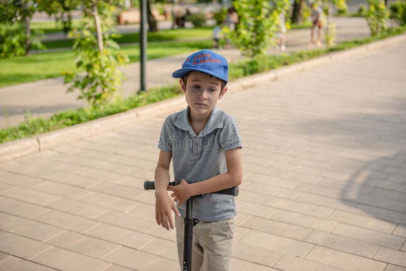 Boy in the Park Riding a Scooter Stock Image - Image of balance ...