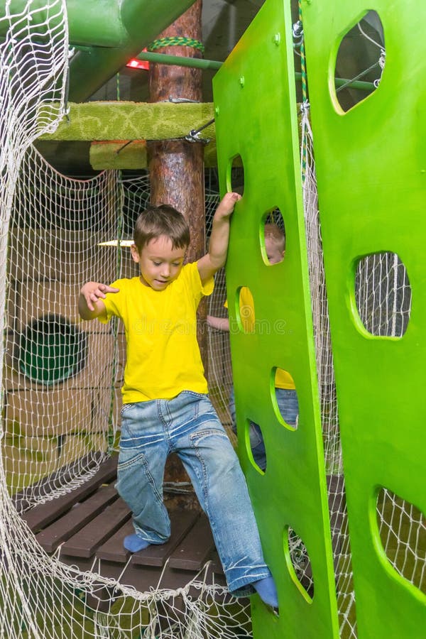 Boy Passes the Obstacle Course, Cable Car. Stock Photo - Image of ...