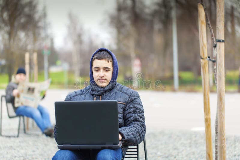 Boy with PC stock image. Image of chair, book, handsome - 35804361