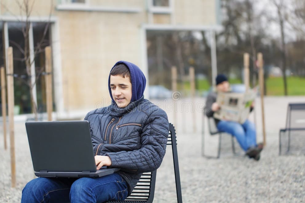 Boy with PC stock image. Image of businessman, bench - 35804363