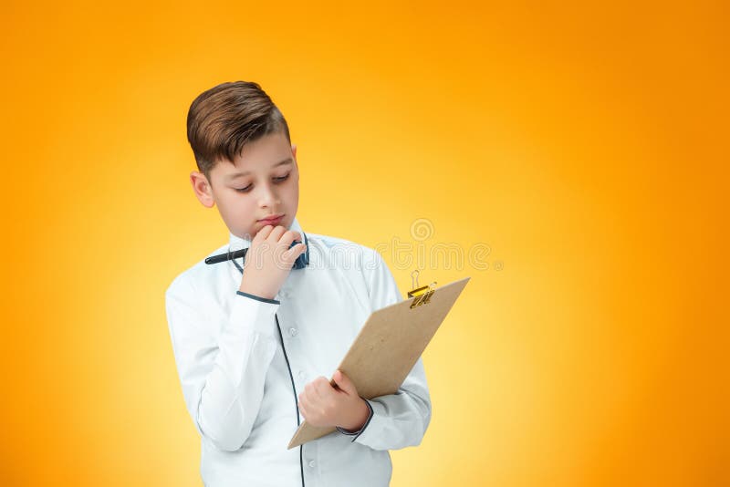The Boy with Pen and Tablet for Notes Stock Image - Image of childhood ...