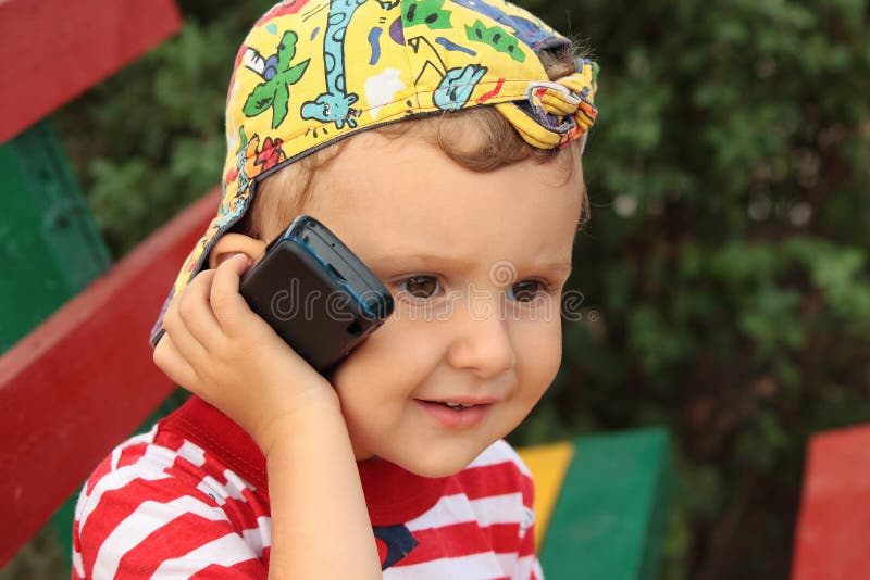 The boy with the phone. stock photo. Image of calls, lovely - 21724580